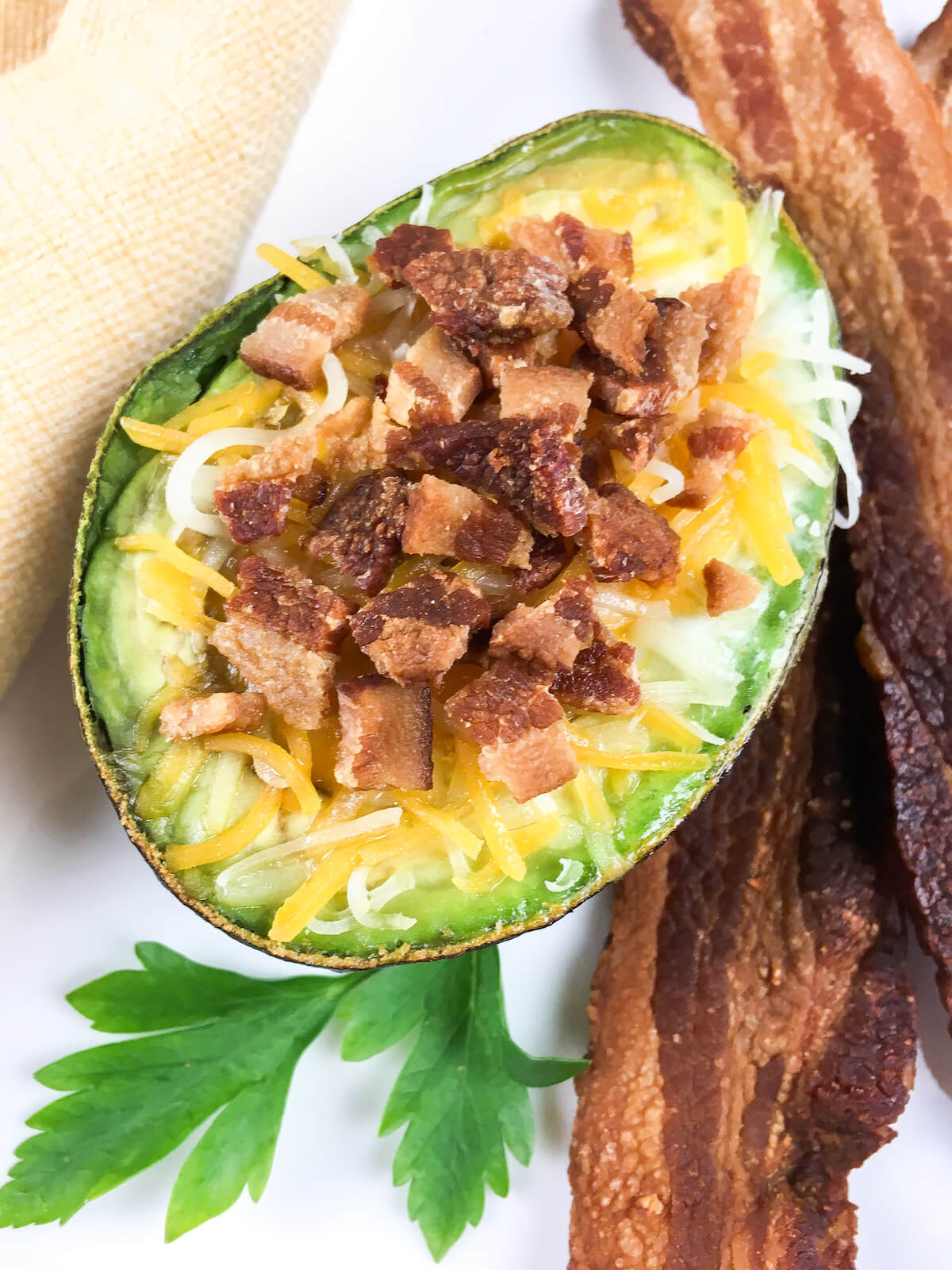 Loaded Avocado Baked Eggs - Recipes & Me